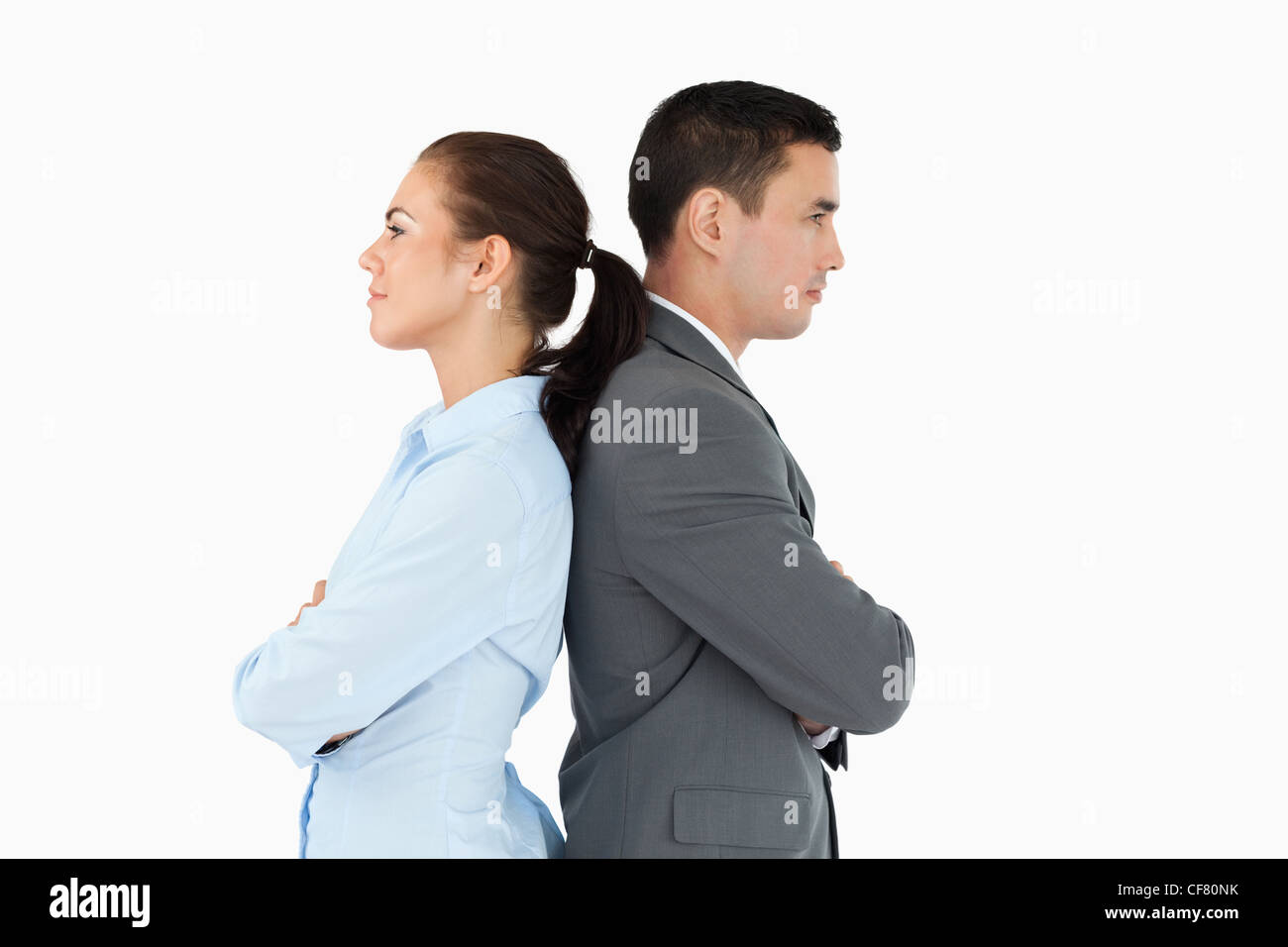 Business partners back-to-back Stock Photo - Alamy