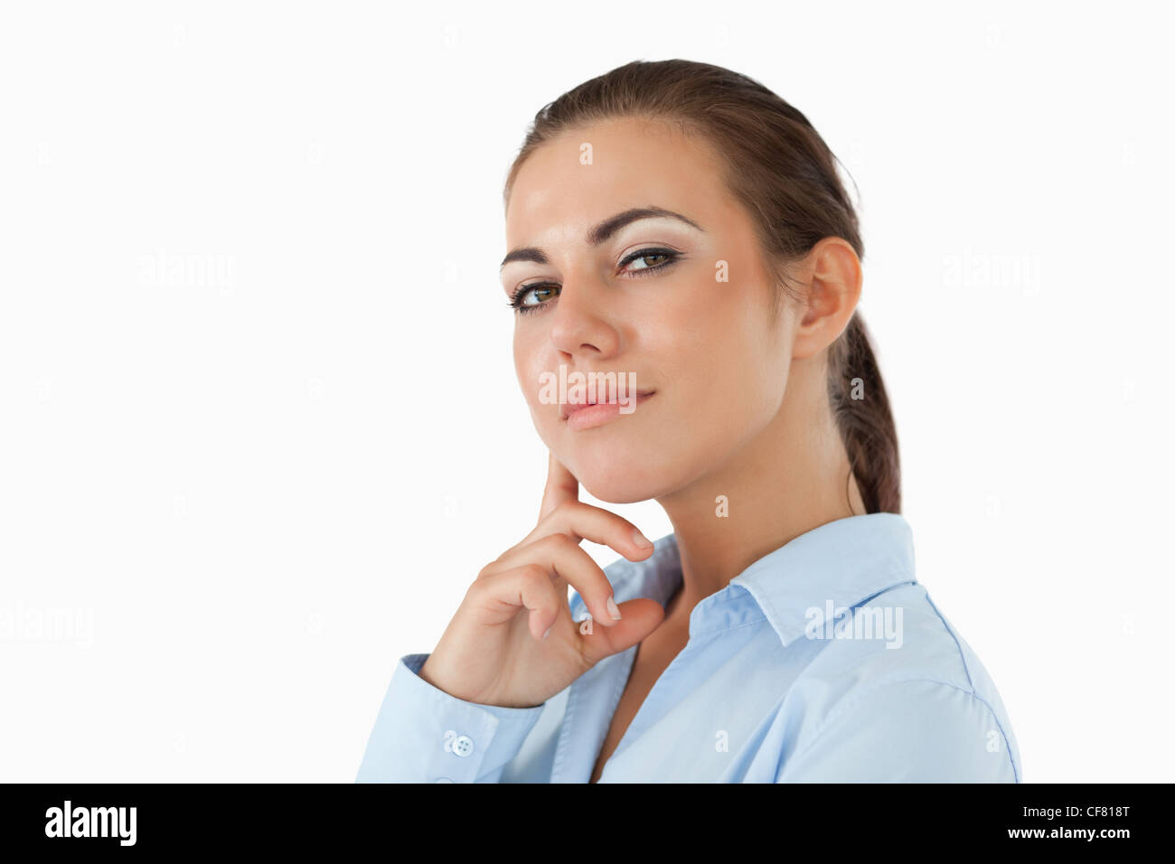 Side view of thinking young businesswoman Stock Photo - Alamy