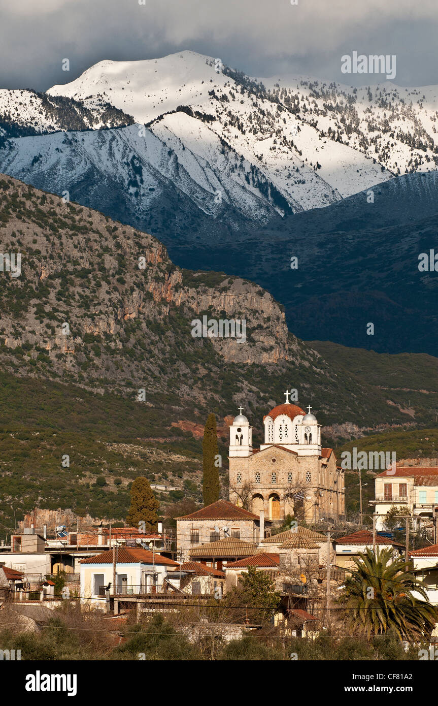 The snow covered mountains of the Taygetos range loom over the Outer ...