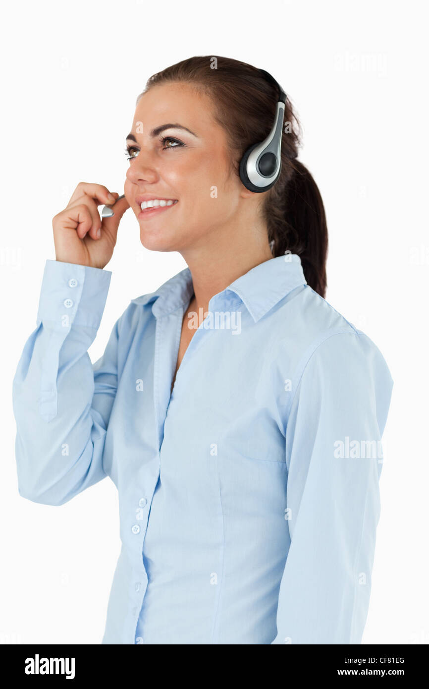 Side view of female call center agent Stock Photo - Alamy