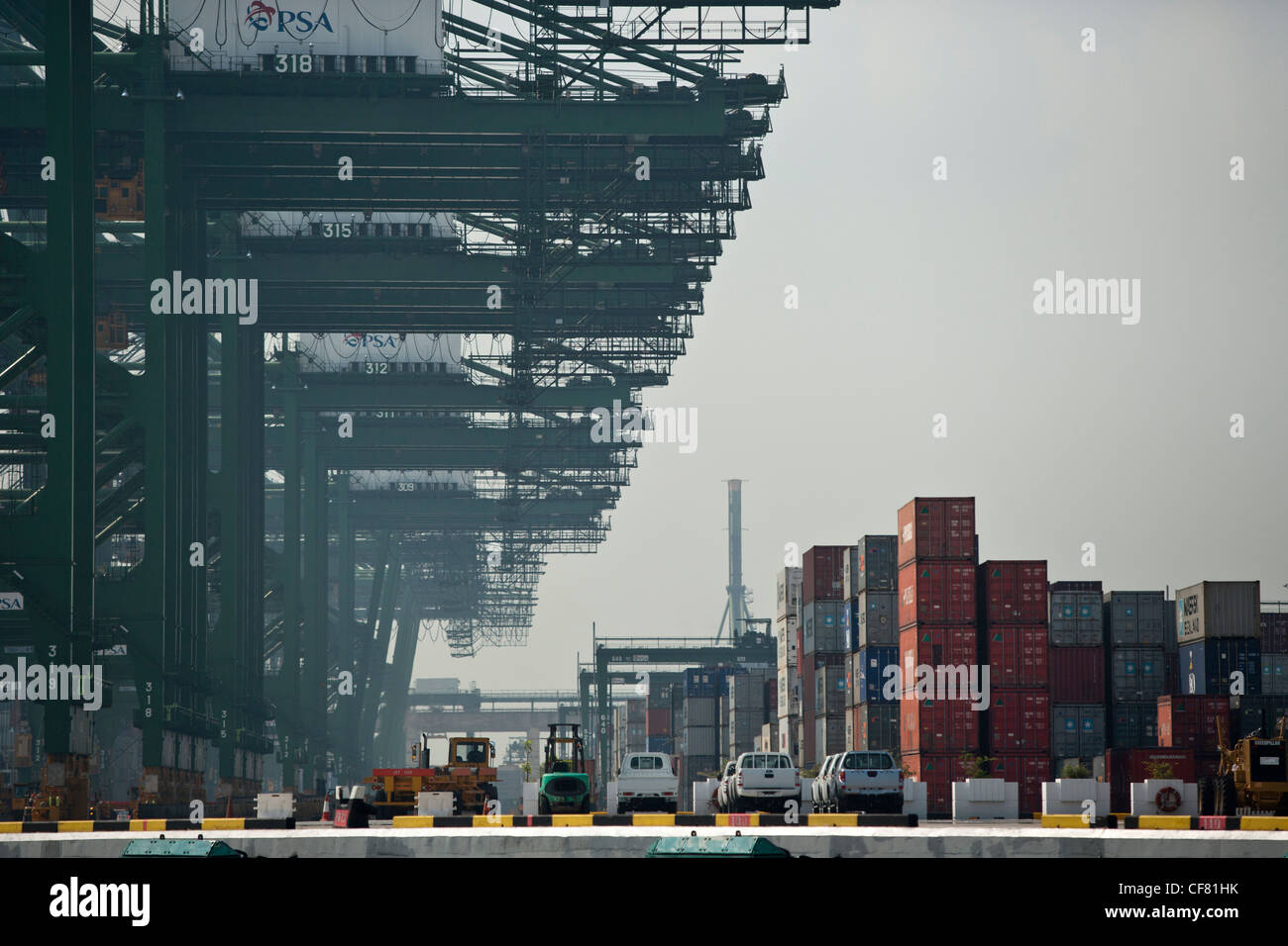 Cargo containers are seen stacked at the Pasir Panjang terminal of the ...