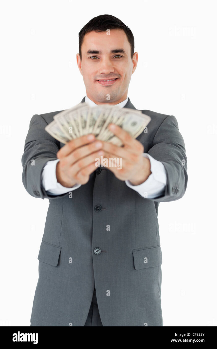 Smiling businessman presenting his bank notes Stock Photo - Alamy