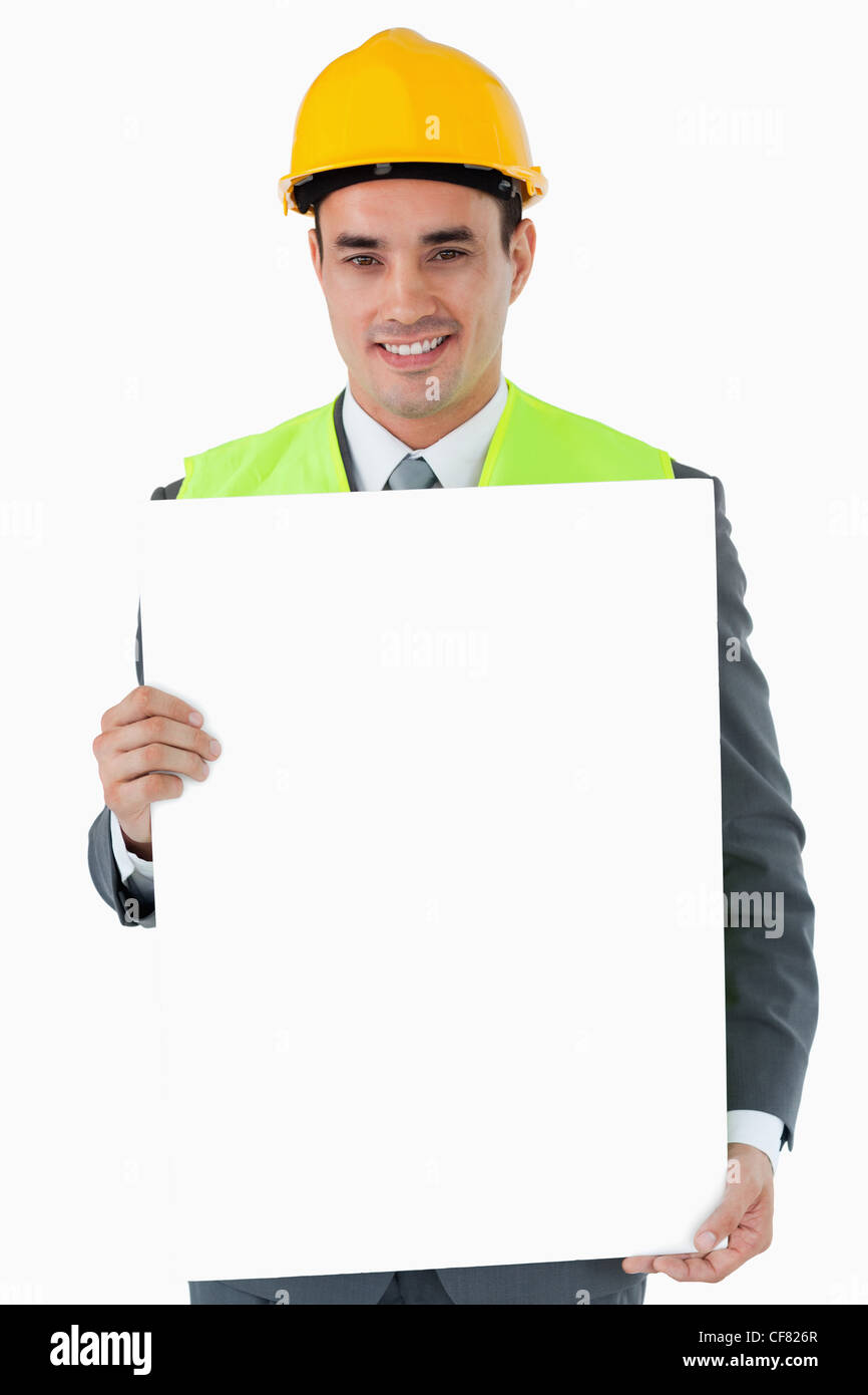 Smiling architect holding sign Stock Photo - Alamy Smiling architect holding sign Stock Photo - Alamy