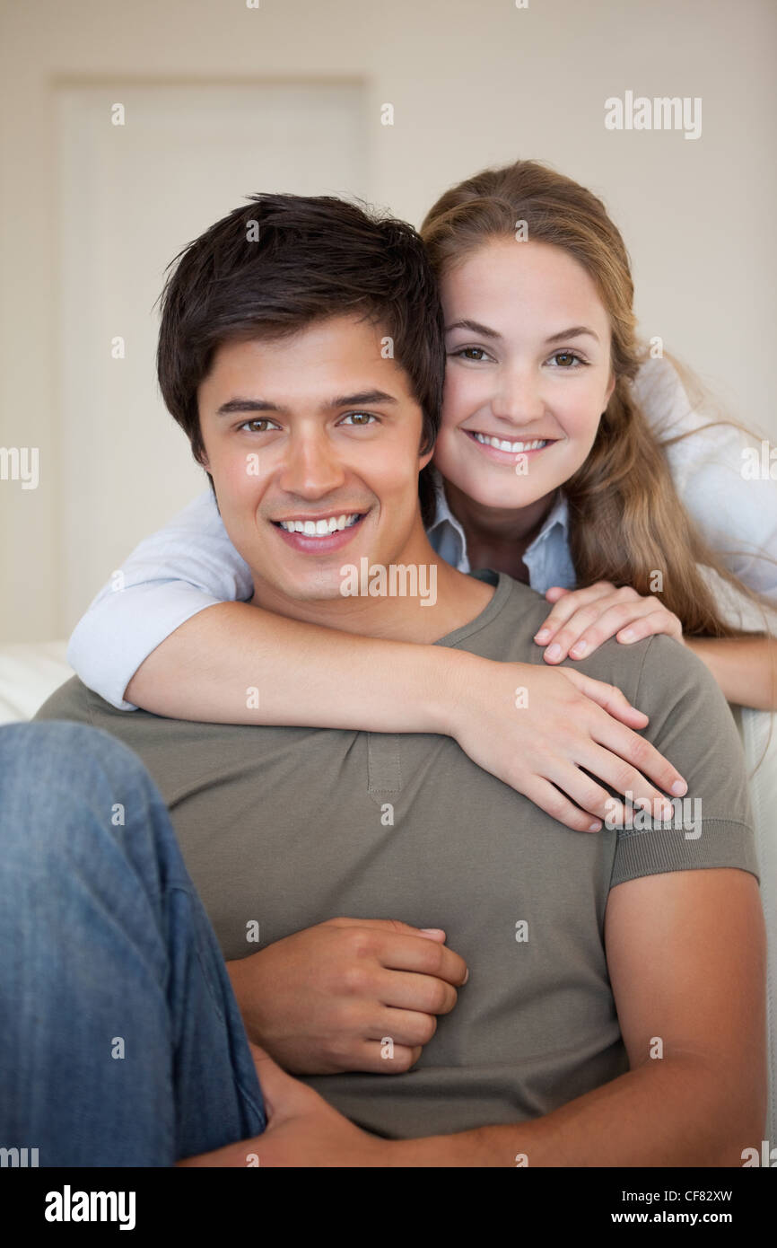 Portrait of a couple hugging Stock Photo - Alamy