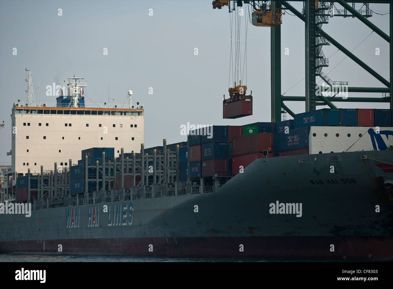 Container ships are seen moored at the Pasir Panjang terminal of the ...