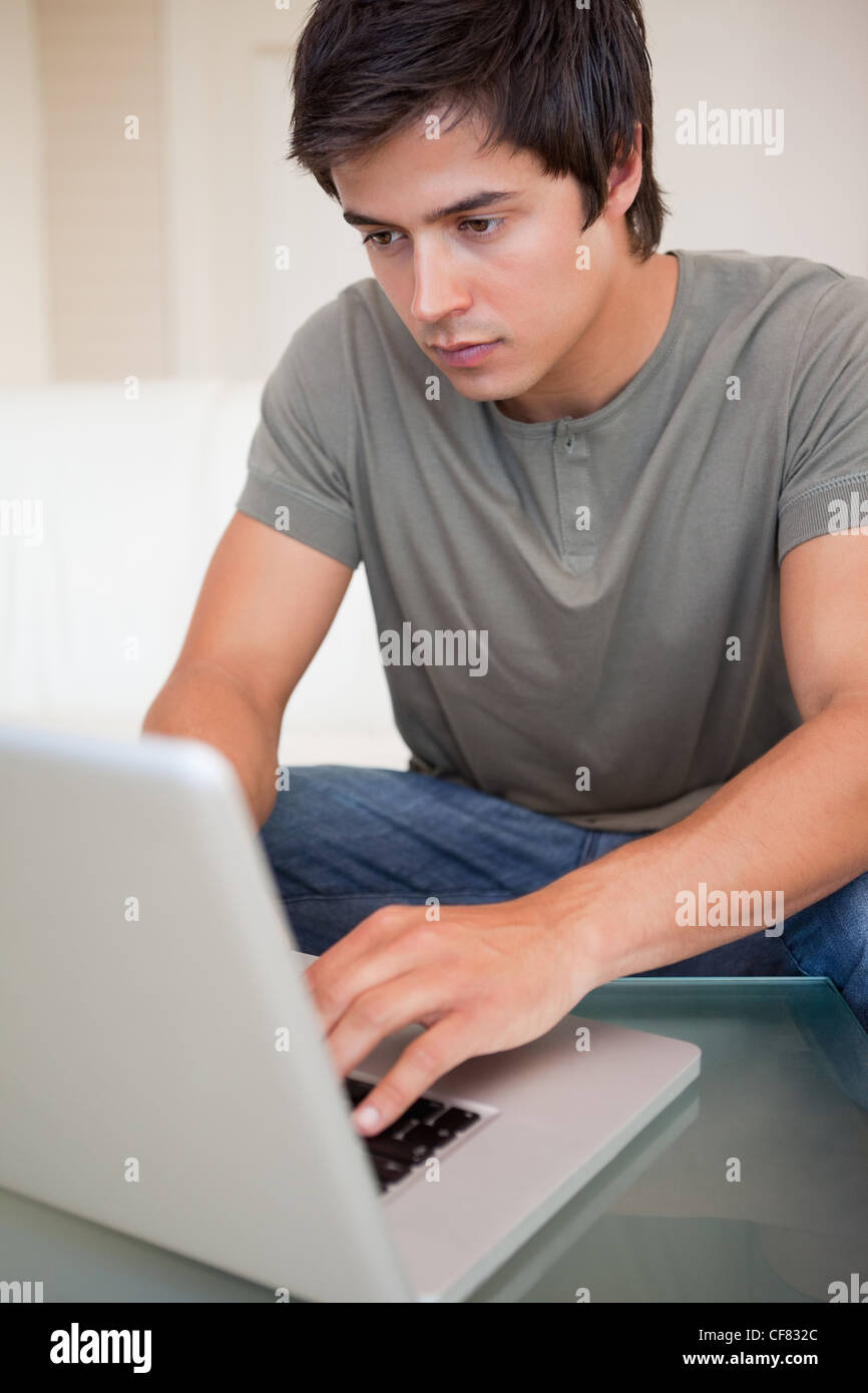 Portrait of a man using a laptop Stock Photo - Alamy