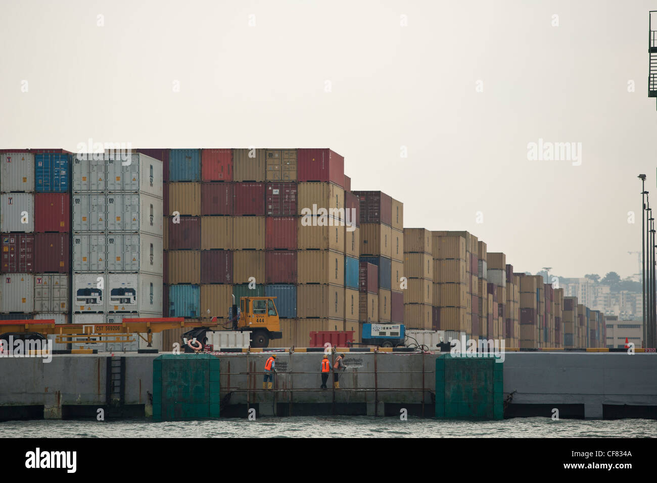 Cargo containers are seen stacked at the Pasir Panjang terminal of the ...