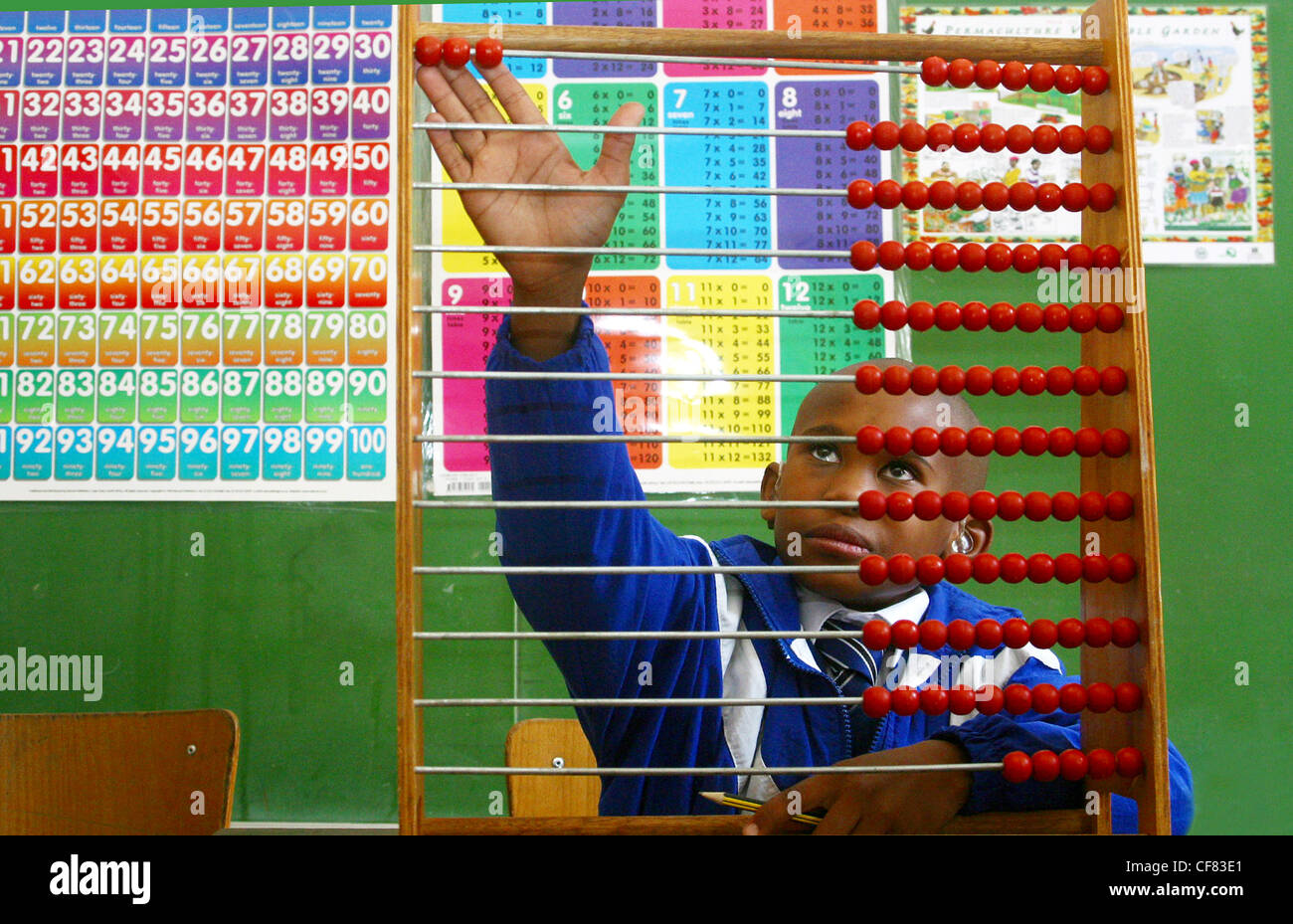 Young learner learning to count at Saint Vincent Primary School in ...