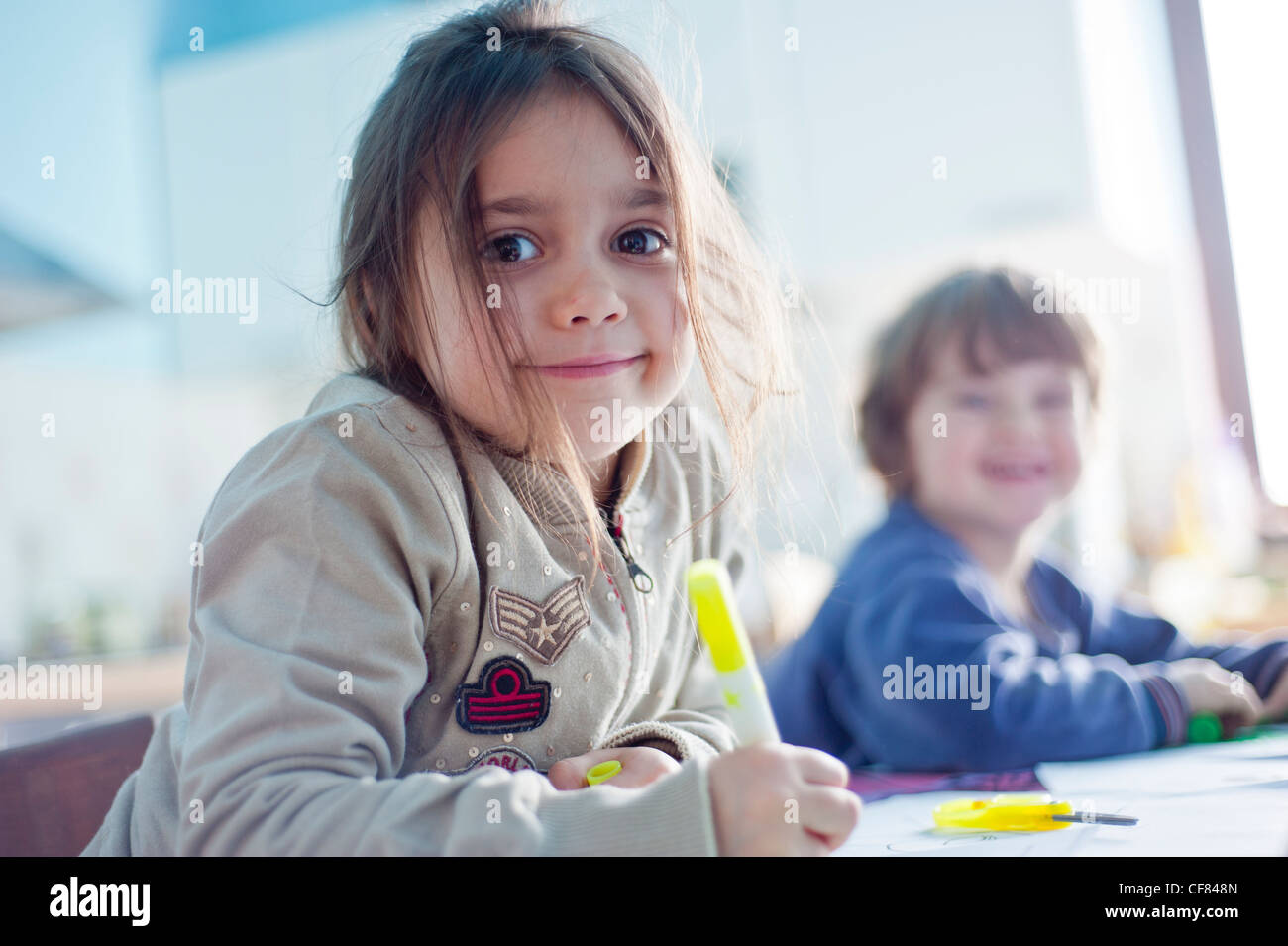children draw and cut at home Stock Photo - Alamy