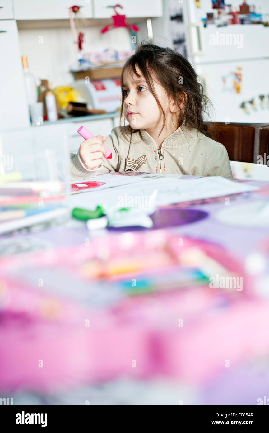 children draw at the table of kitchen Stock Photo - Alamy
