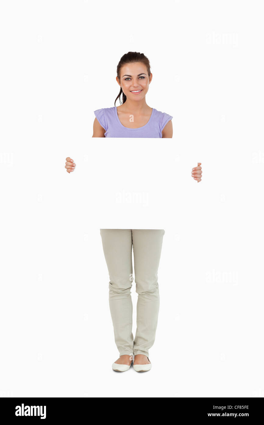 Young female holding sign Stock Photo - Alamy