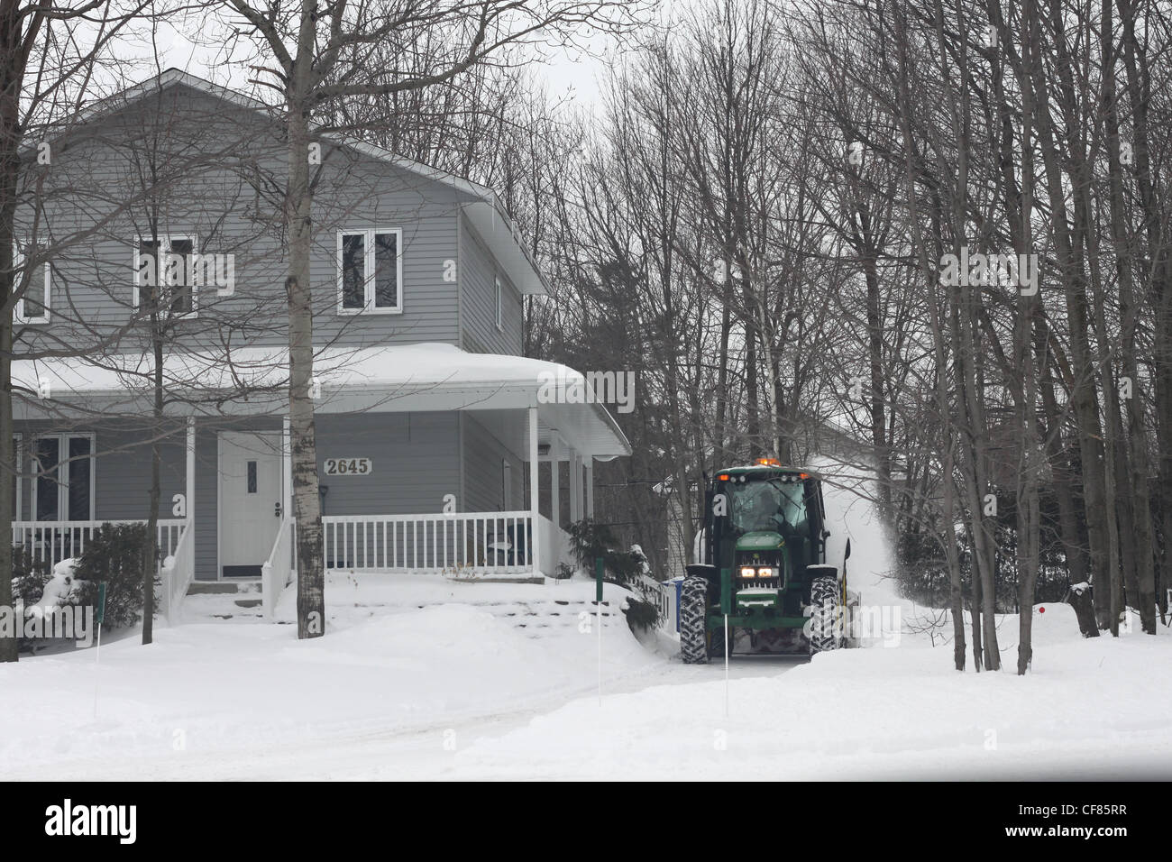 Driveway snow blower in winter Stock Photo - Alamy