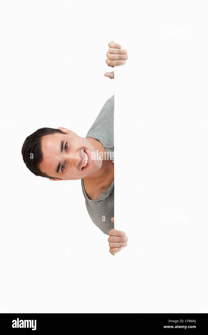 Man Looking Around Corner High Resolution Stock Photography and Images ...