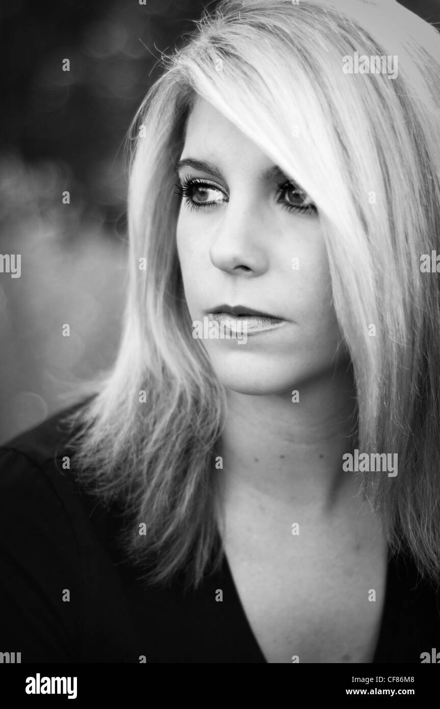 black and white of a young woman thinking Stock Photo - Alamy