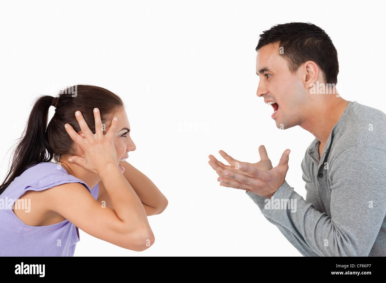 Young couple yelling at each other Stock Photo - Alamy