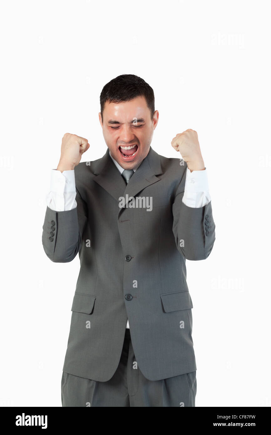 Mixed race man fist up office hi-res stock photography and images - Alamy