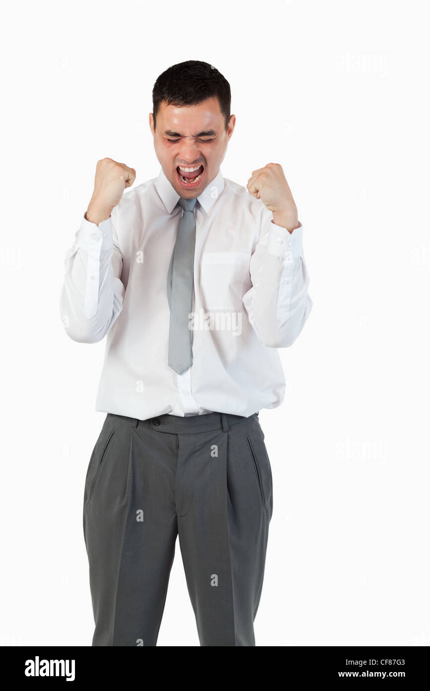 Mixed race man fist up office hi-res stock photography and images - Alamy