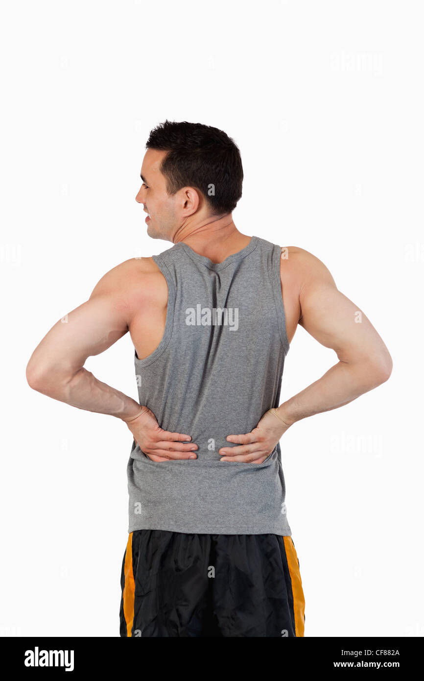 Portrait of a man having a back pain Stock Photo - Alamy