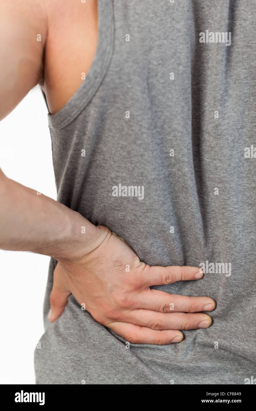 Male hands touching own back Stock Photo - Alamy