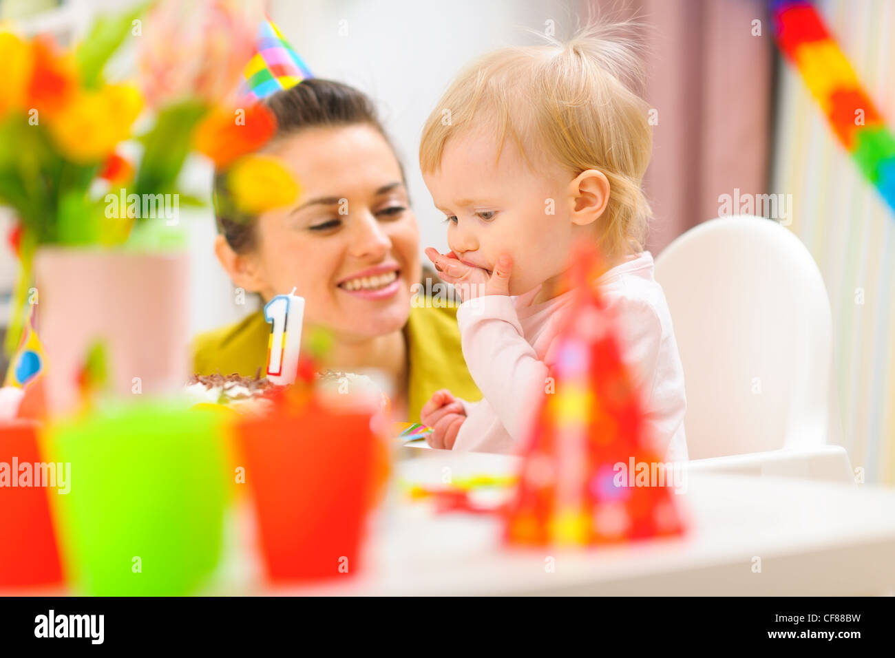 Baby and mother partying first birthday Stock Photo - Alamy
