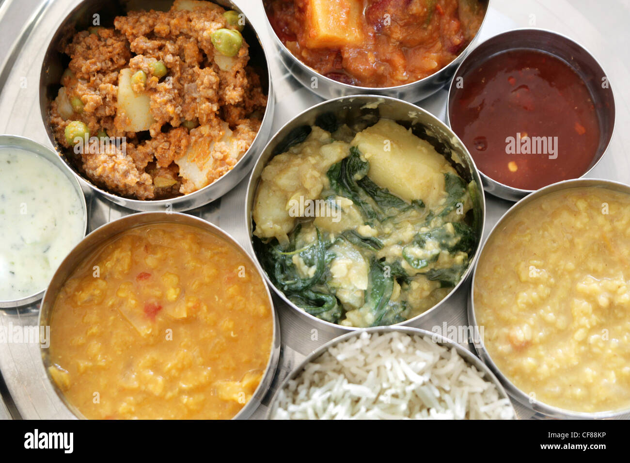 A meat thali, minced lamb and potato curry, dhal, rice , mixed ...