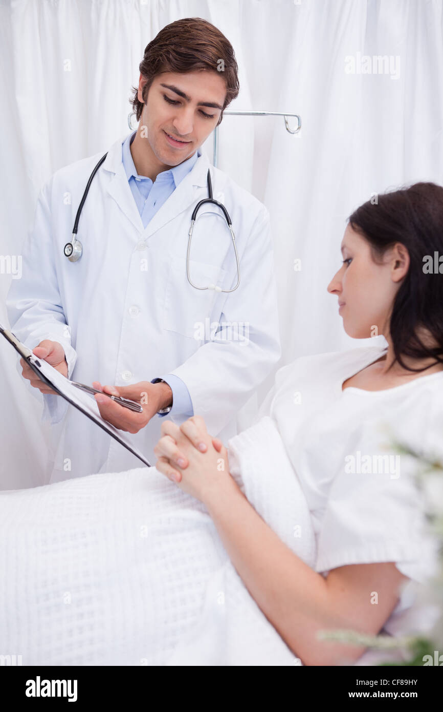 Doctor explaining surgery to his patient Stock Photo - Alamy