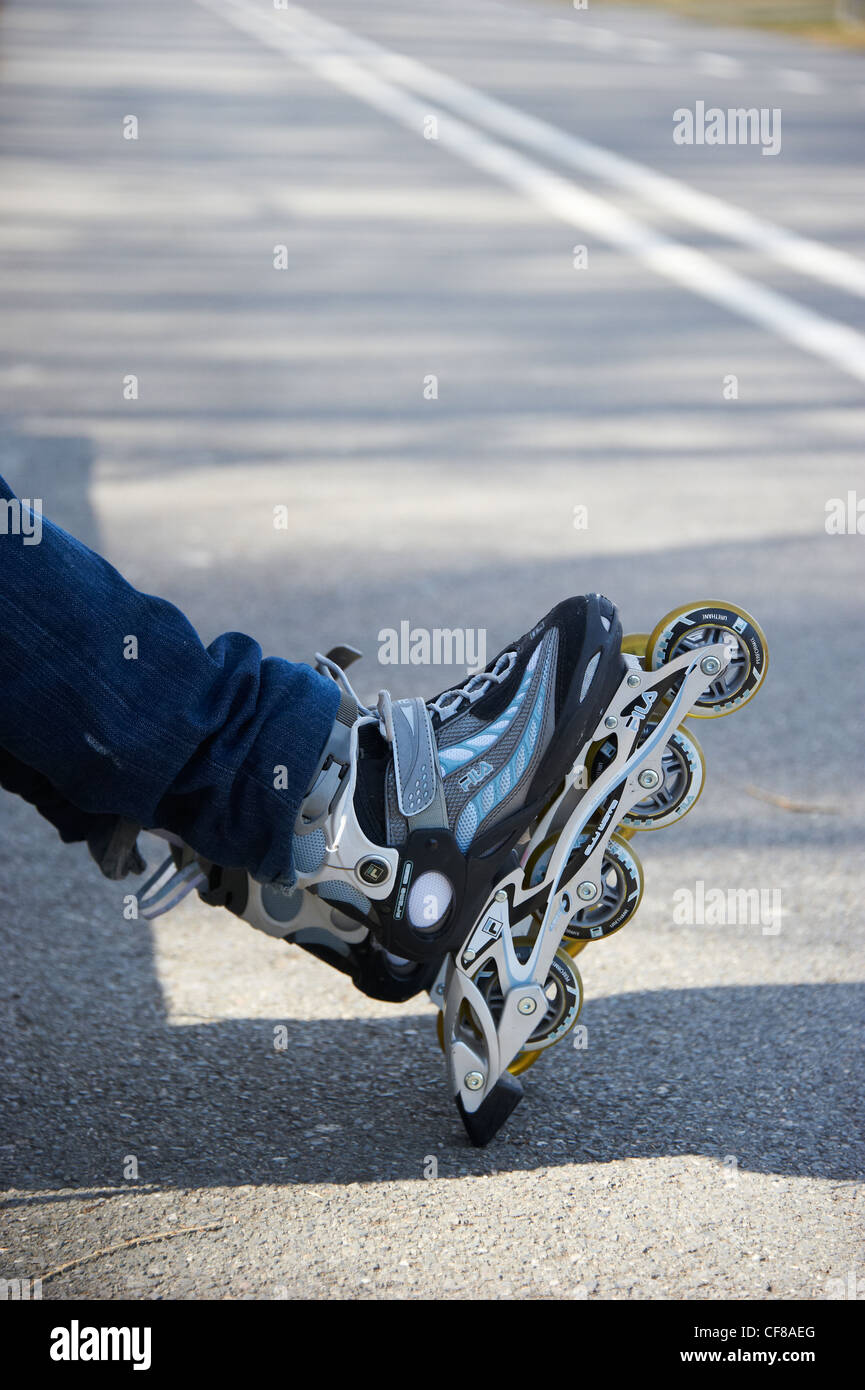 Girl Wearing In Line Skates High Resolution Stock Photography and ...