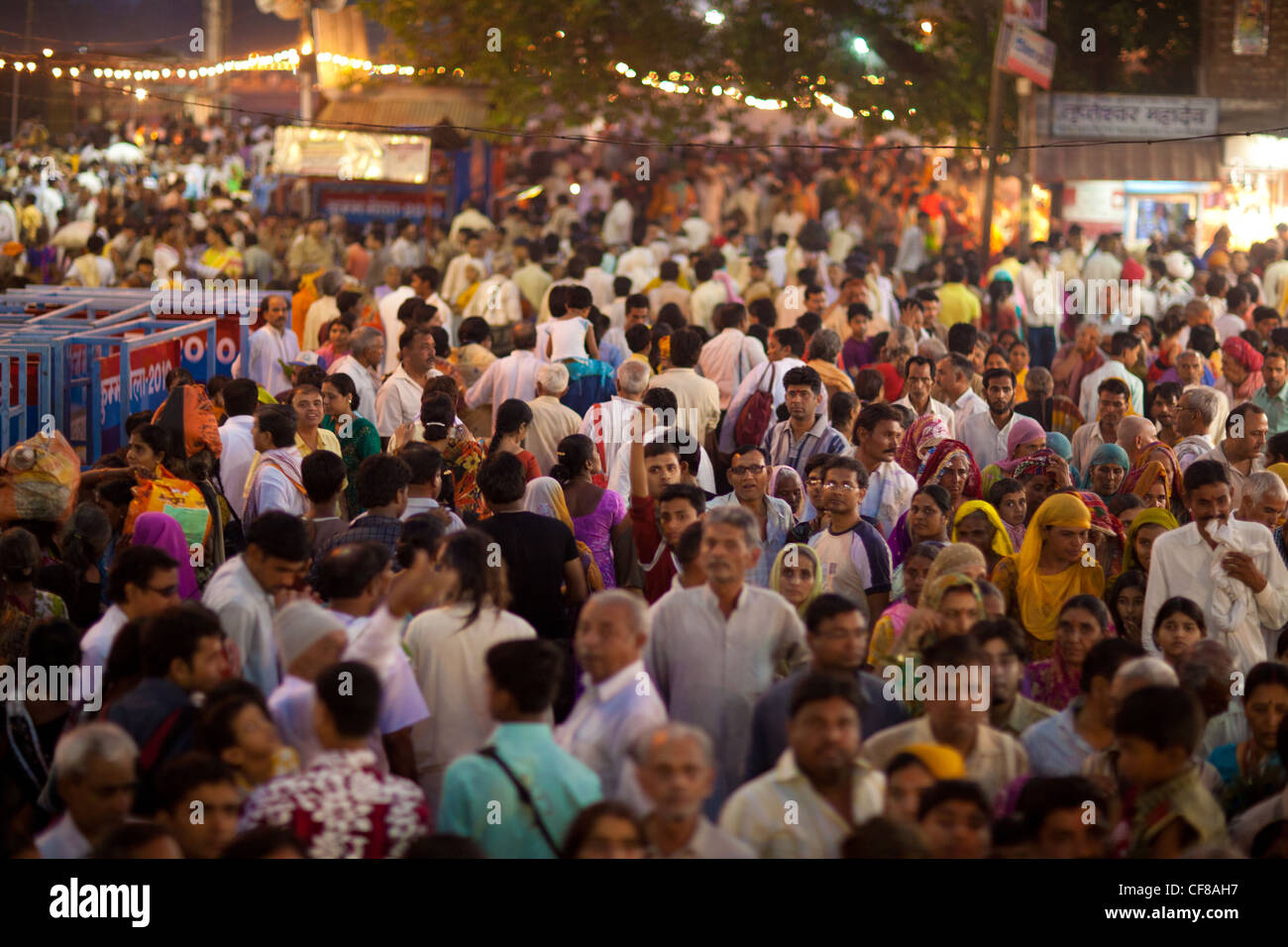 Crowd of people celebrating the Kumba Mela Kumbh Festival. Location is ...