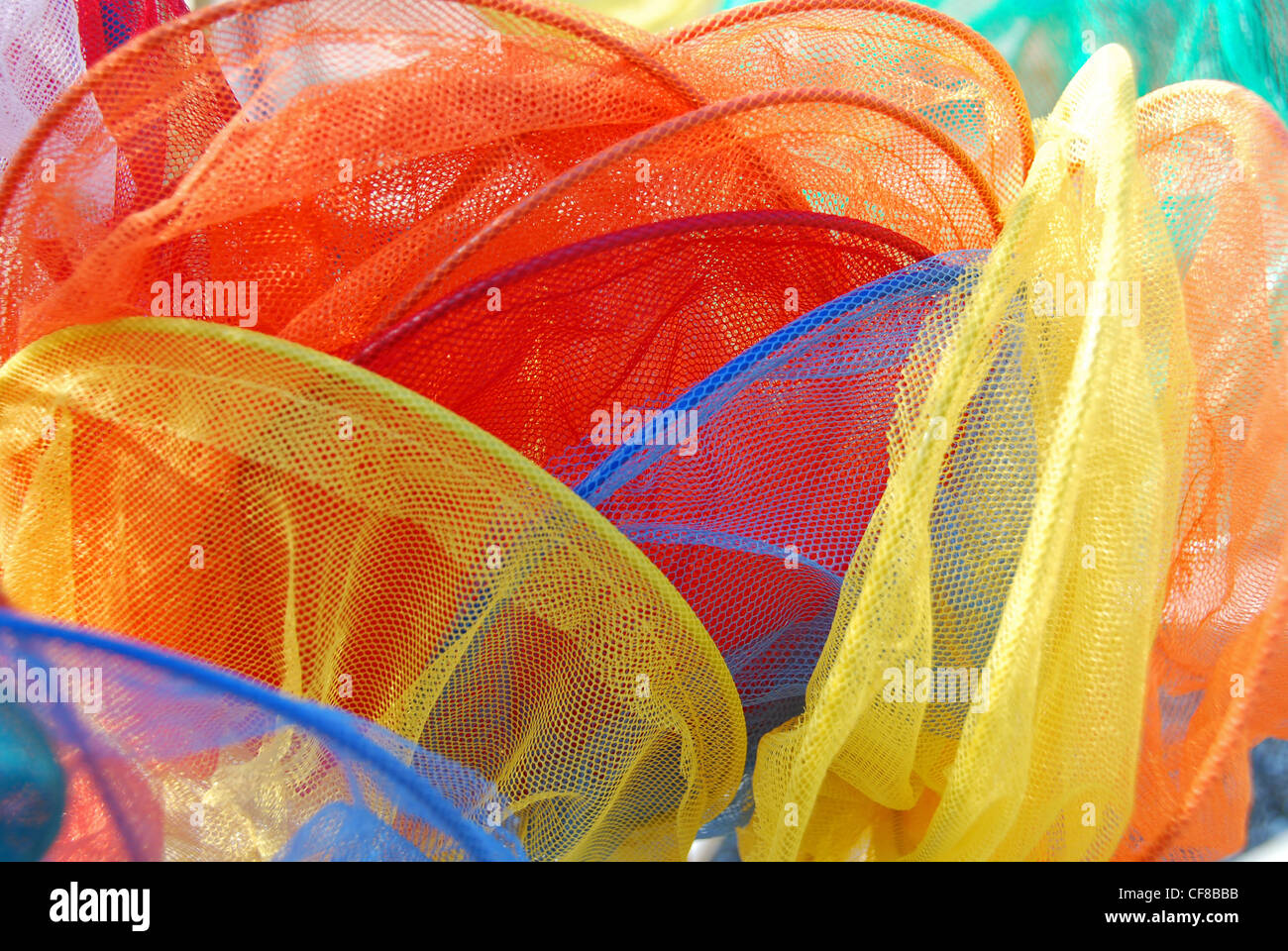 coloured fishing nets Stock Photo - Alamy