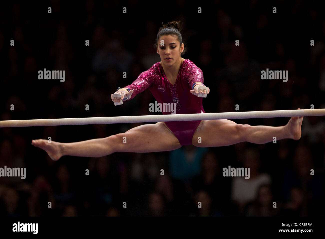 Alexandra Raisman (USA) competes in theuneven bars event at the 2012 ...