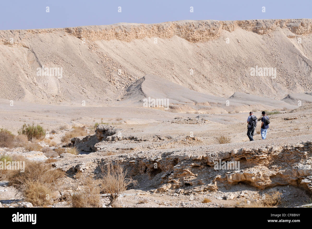 Israel, Arava two hikers in a desert landscape Stock Photo - Alamy