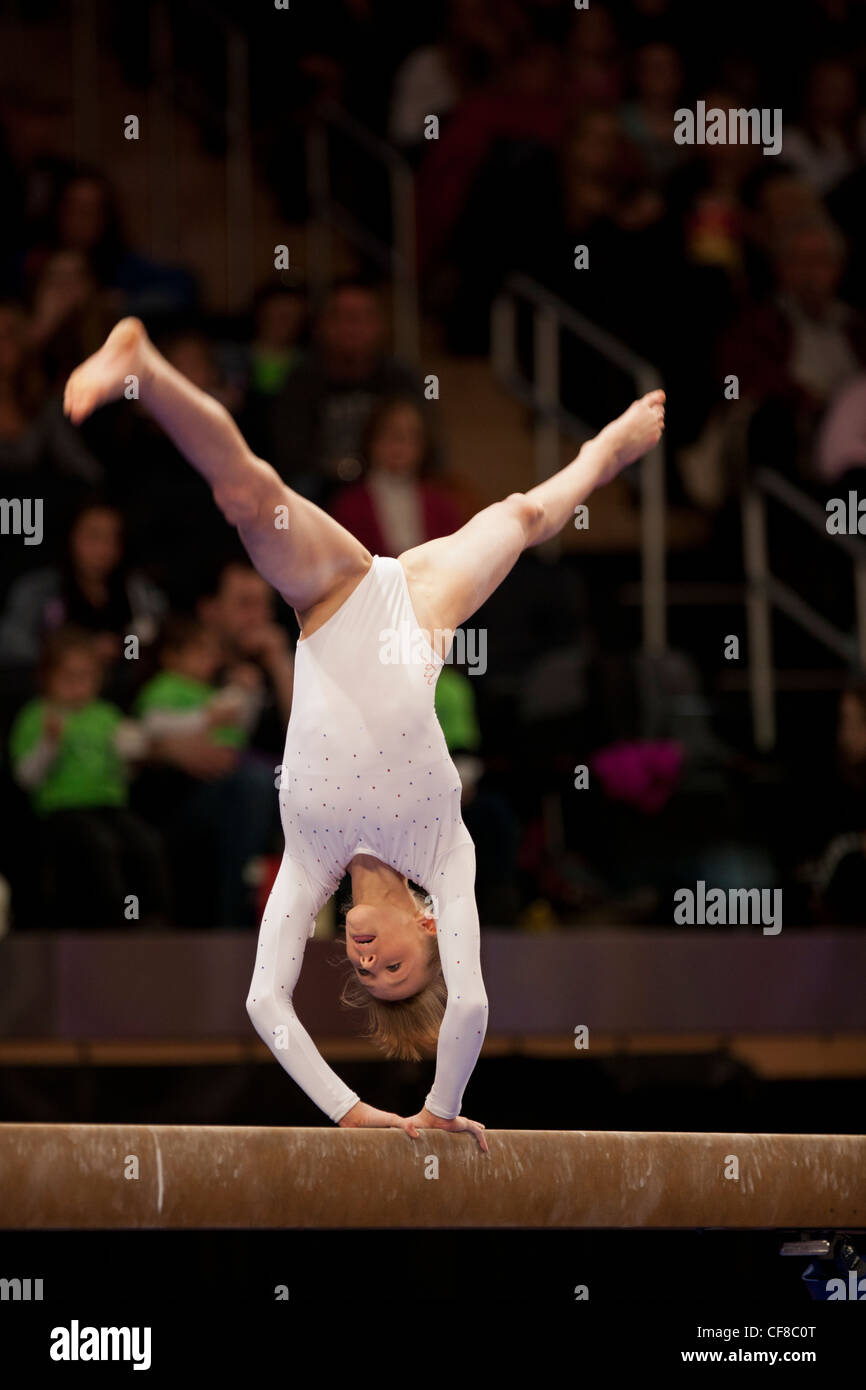 Rebecca Tunney (GBR) competes in the balance beam event at the 2012 ...