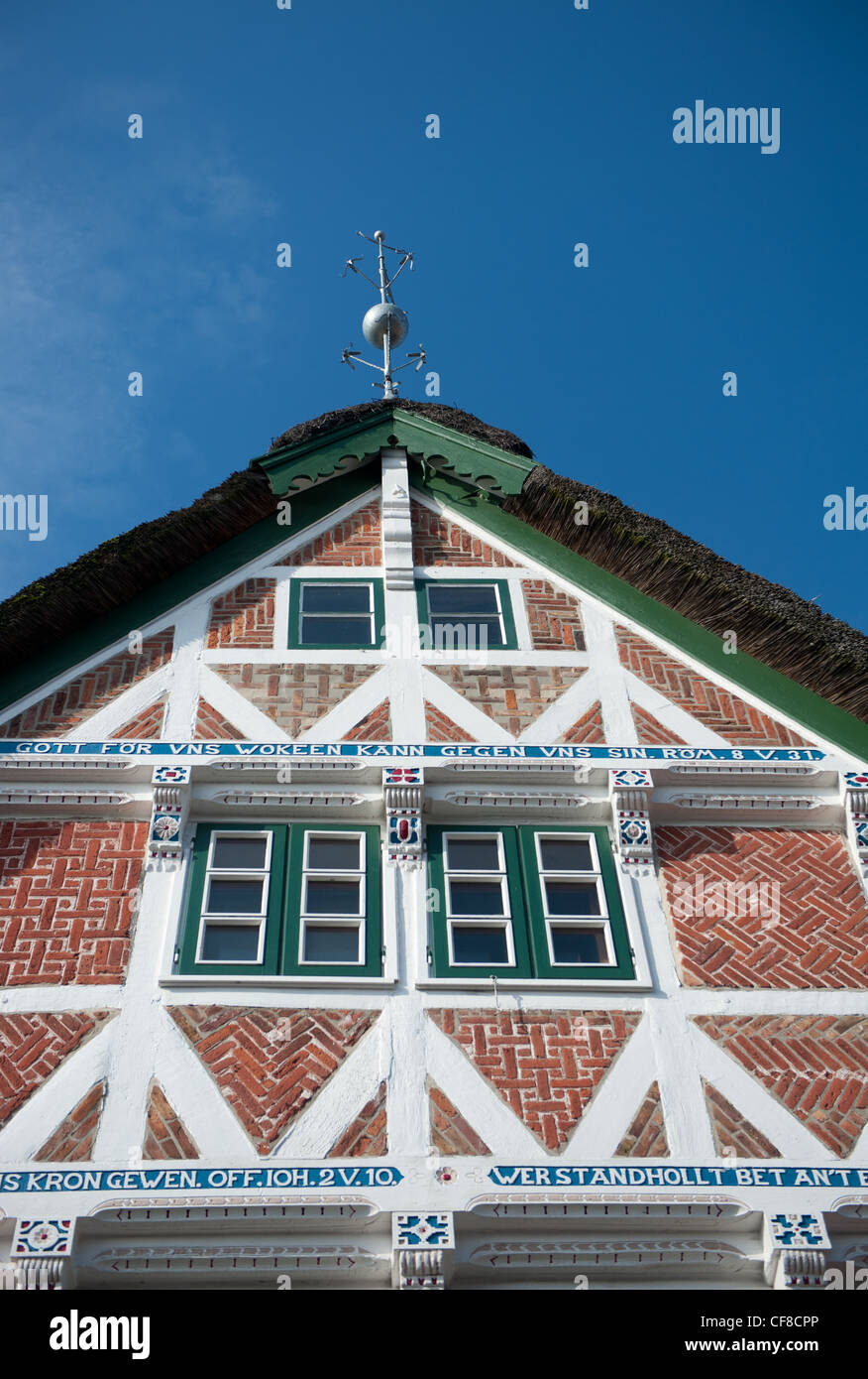Gable with biblical psalm inscribed on the wood of the half-timbered ...