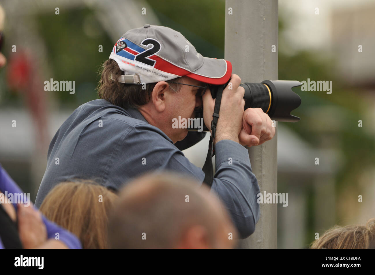 Man taking a photograph Stock Photo - Alamy