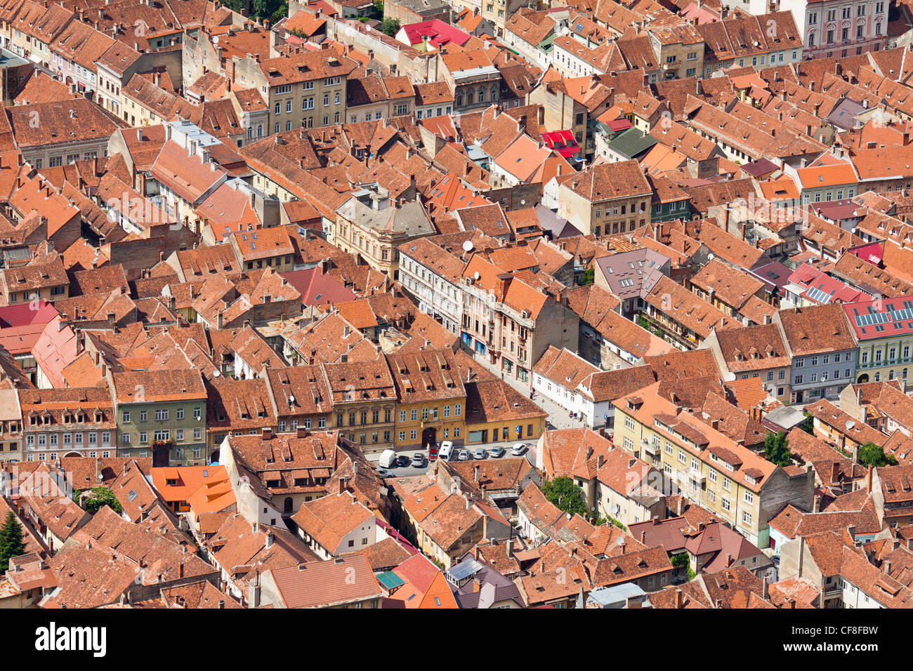 Aerial cityscape with a road crossing the historic center of Brasov ...