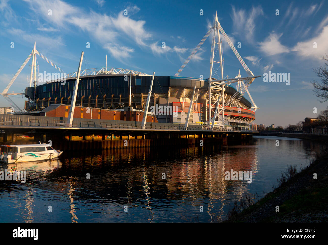 Millennium Stadium with waterbus (Aquabus) passing below on River Taff ...