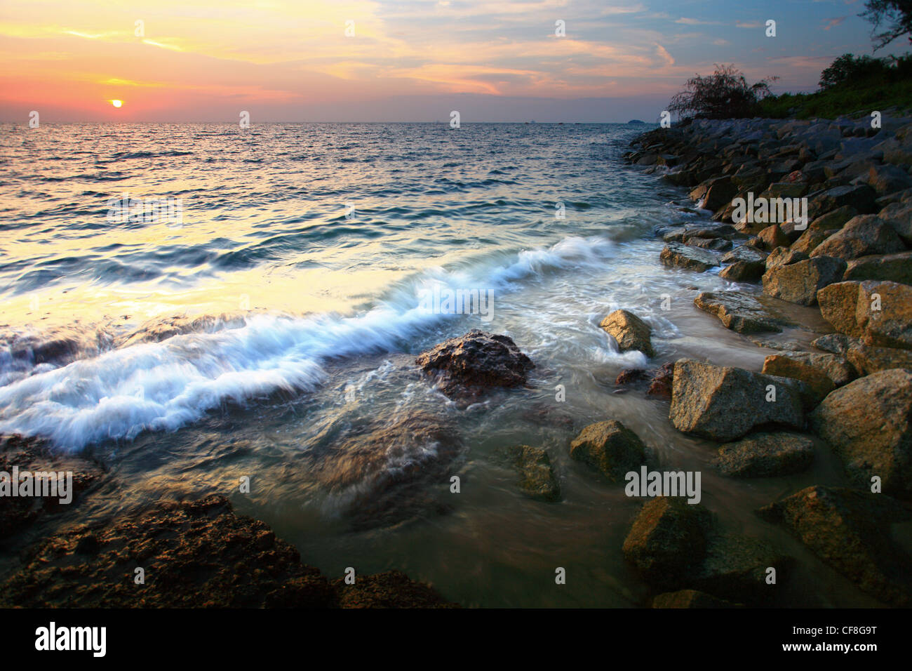 Sunset at Port Dickson beach in Negeri Sembilan, Malaysia Stock Photo ...