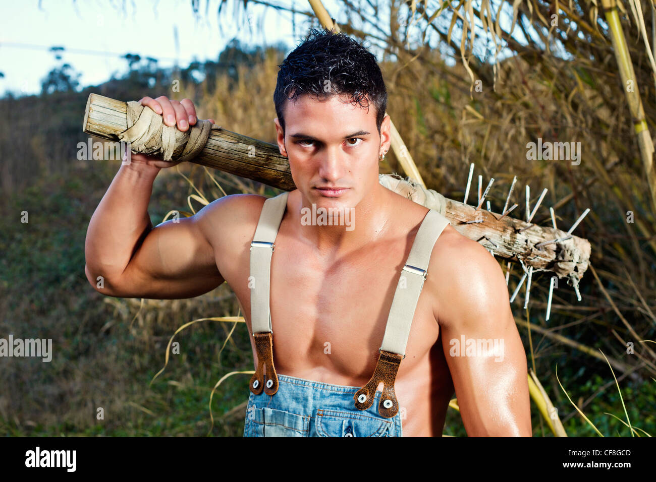 View of a fighter man holding a medieval mace weapon Stock Photo - Alamy