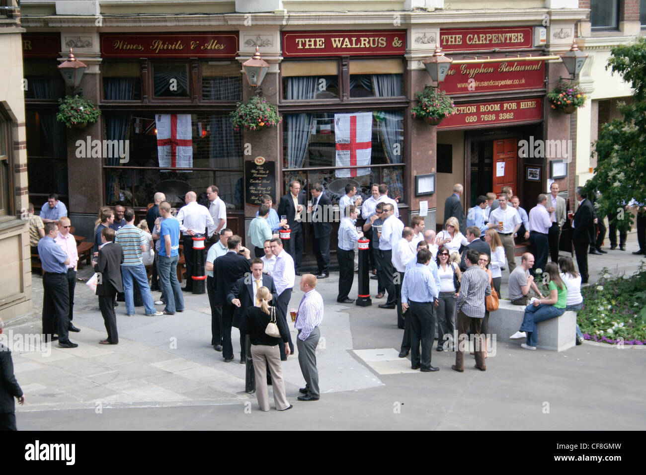 City workers enjoying a drink at a British Pub Stock Photo - Alamy