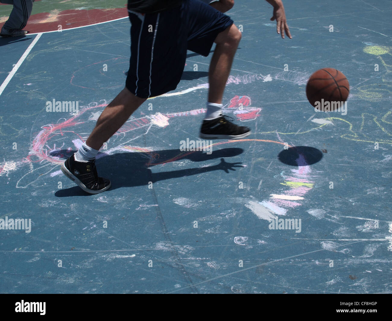 Basketball player on court marked with chalk, Brooklyn, New York Stock ...