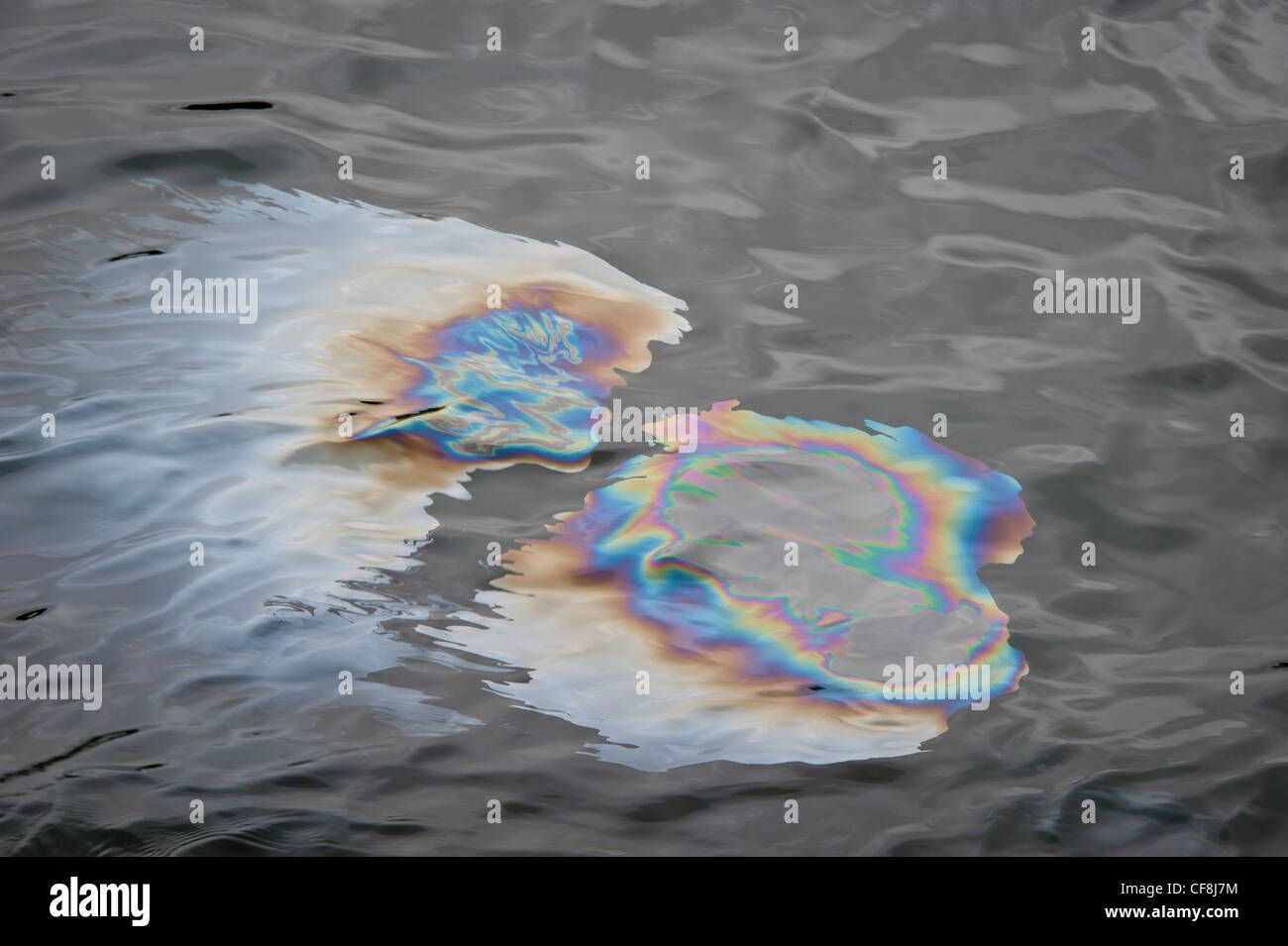 Oil released from the sunken battleship Arizona forms a pattern on the ...