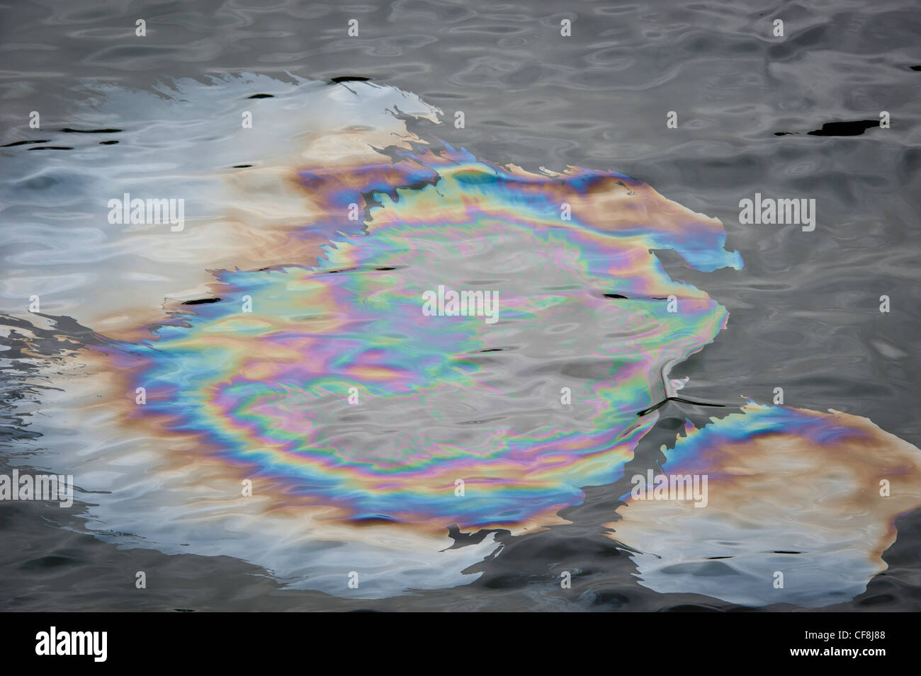 Oil released from the sunken battleship Arizona forms a pattern on the ...