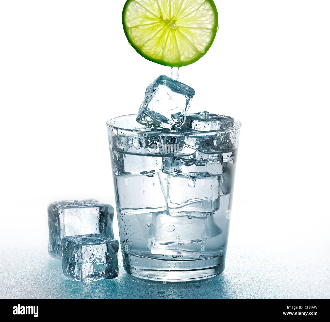 Glass Of Iced Water And Lemon Stock Photo - Alamy