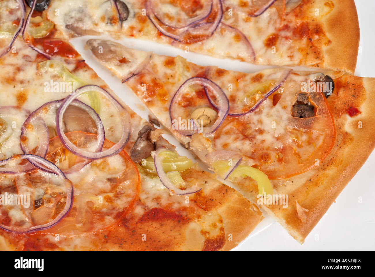 vegetable pizza closeup with tomato, Bulgarian pepper, onion, olive ...