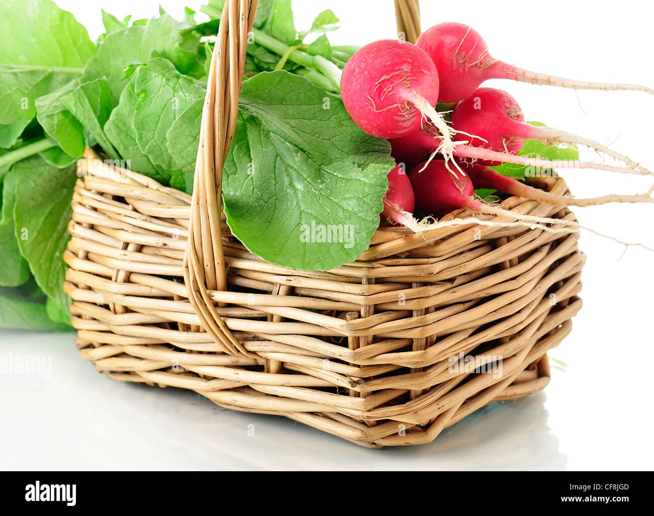 Fresh radishes in basket hi-res stock photography and images - Alamy
