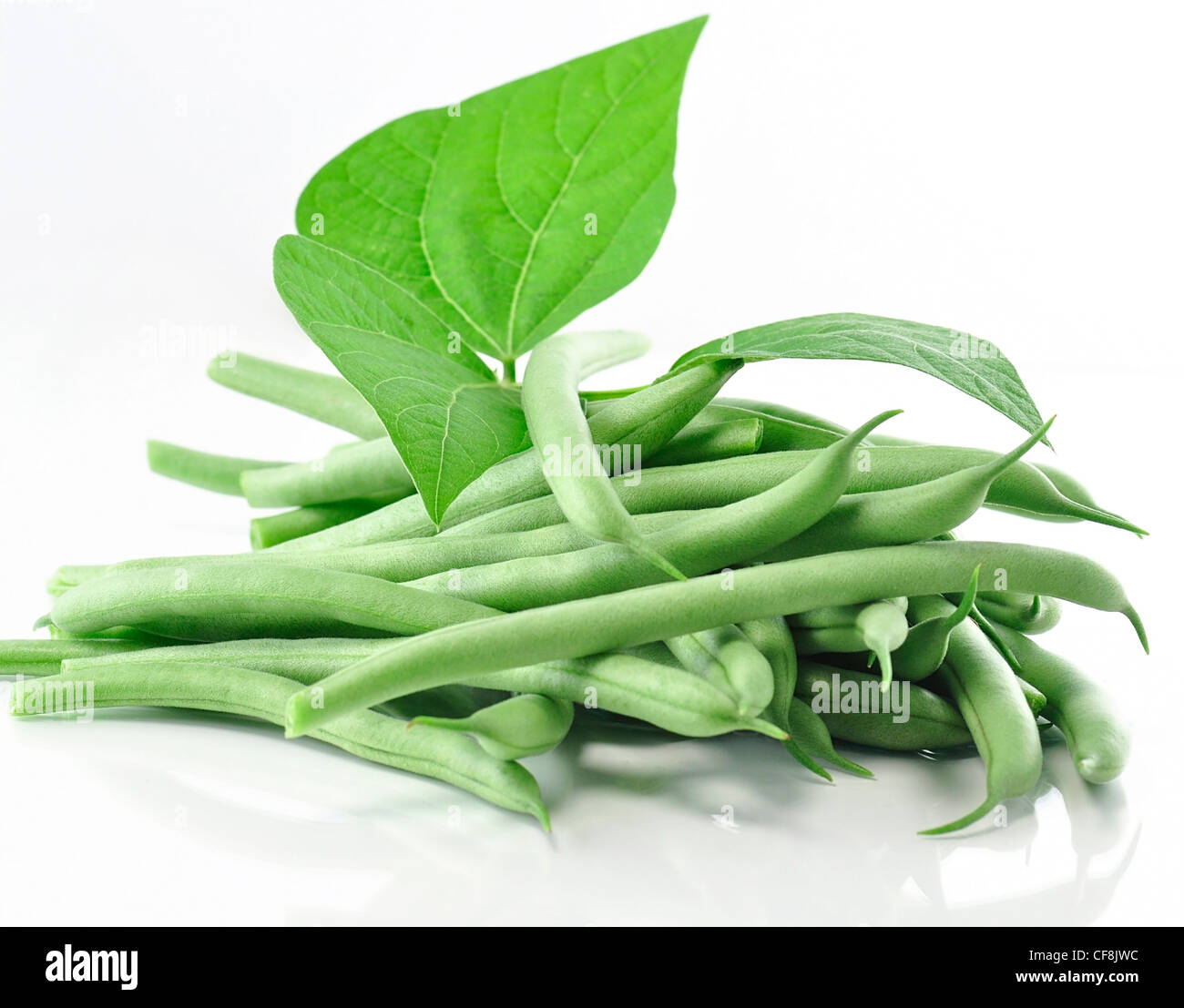 fresh green beans on white background Stock Photo - Alamy