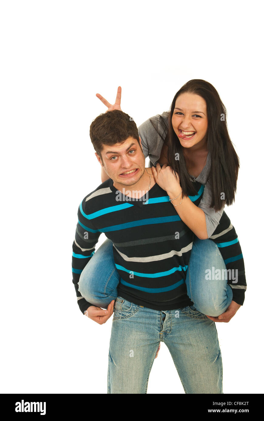 Funny couple piggy back isolated on white background Stock Photo - Alamy