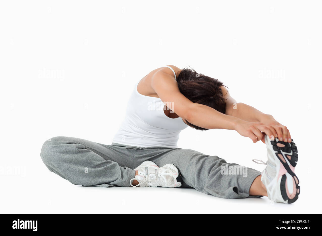 Young woman getting warmed up Stock Photo - Alamy