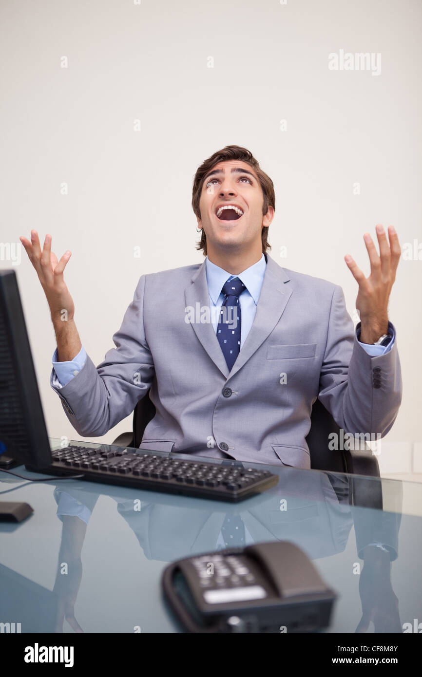 Businessman screaming out loud Stock Photo - Alamy
