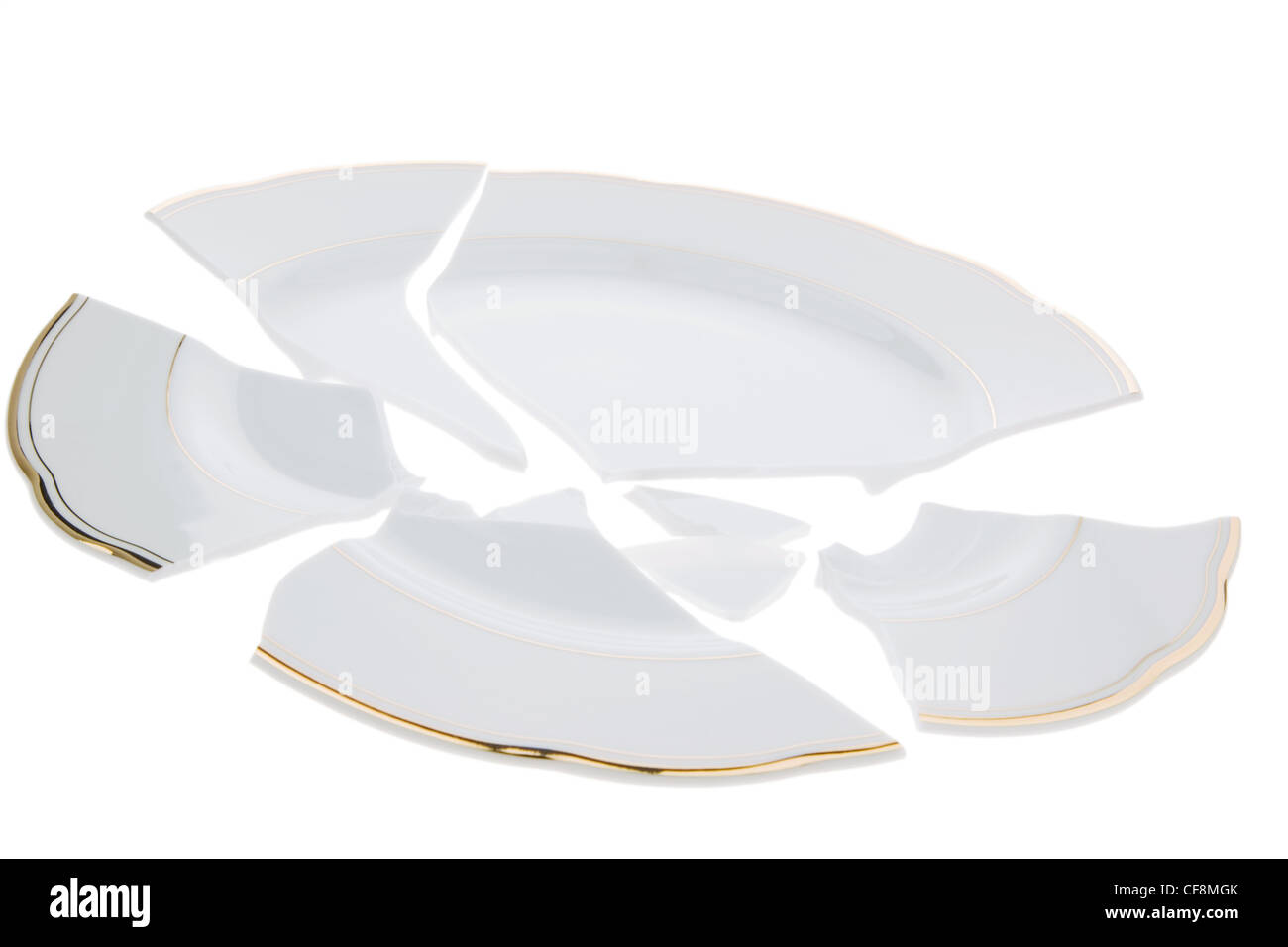 a broken dish is on a white background Stock Photo - Alamy